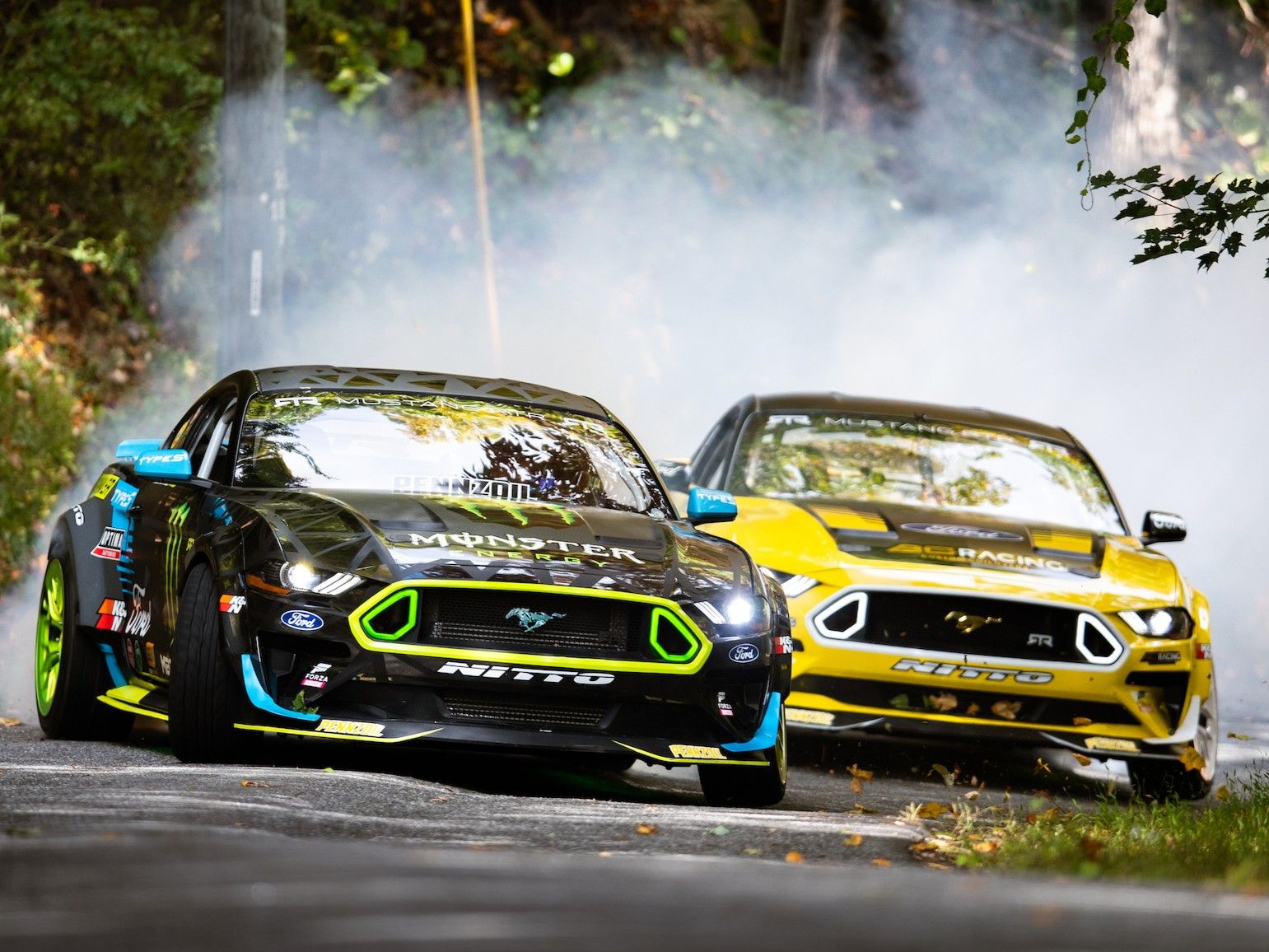 Watch Vaughn Gittin Jr And Chelsea DeNofa Have Tons Of Fun Drifting Two Ford Mustangs