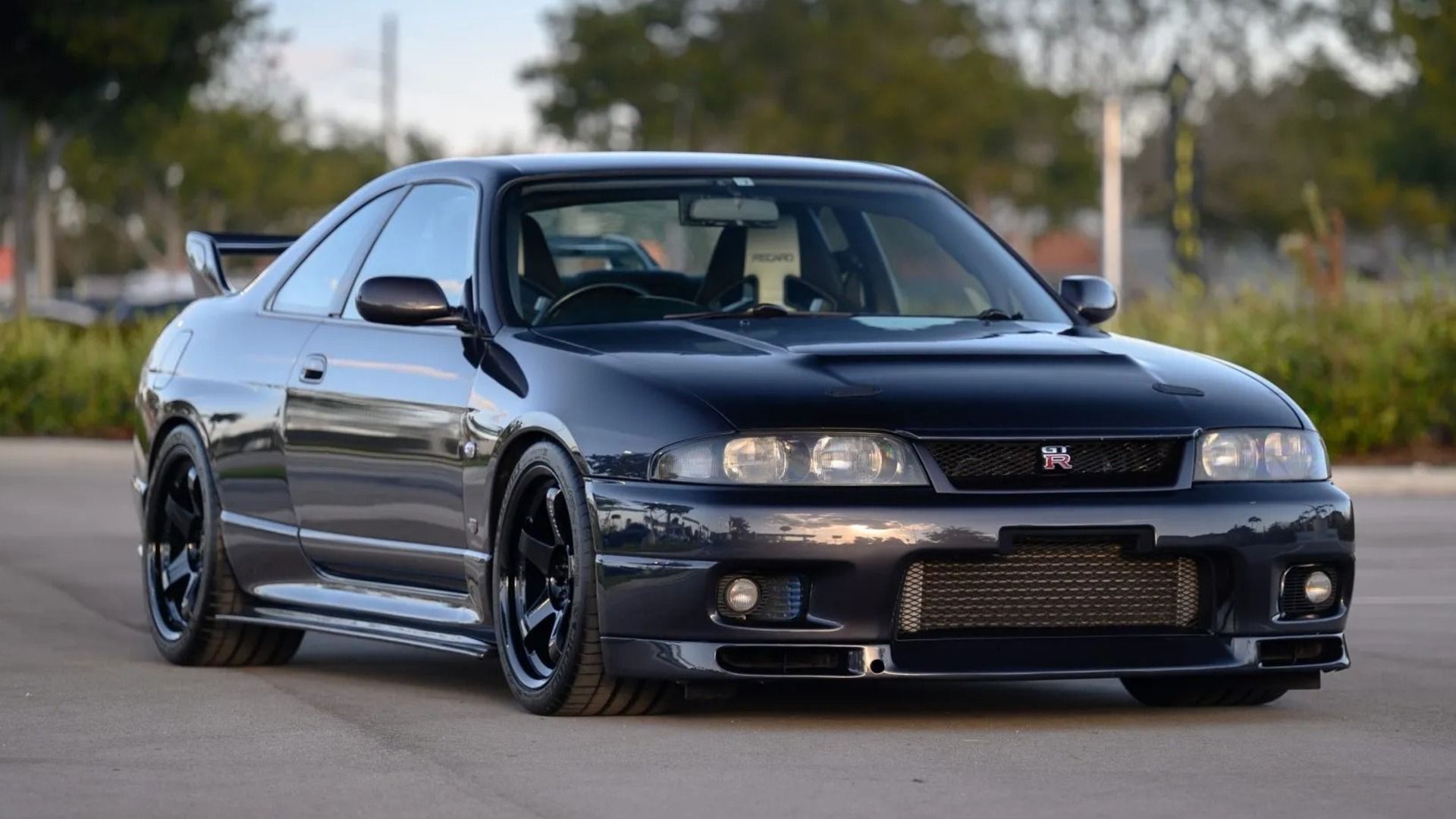 Family-Friendly Godzilla: Remembering The Ultra-Rare 4-Door R34 Nissan Skyline