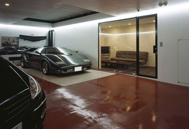 Lamborghini's inside a living room are insanely awesome
