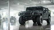 Lambo LM002 EV Vs Hummer EV An Old Rivalry Reinstated 