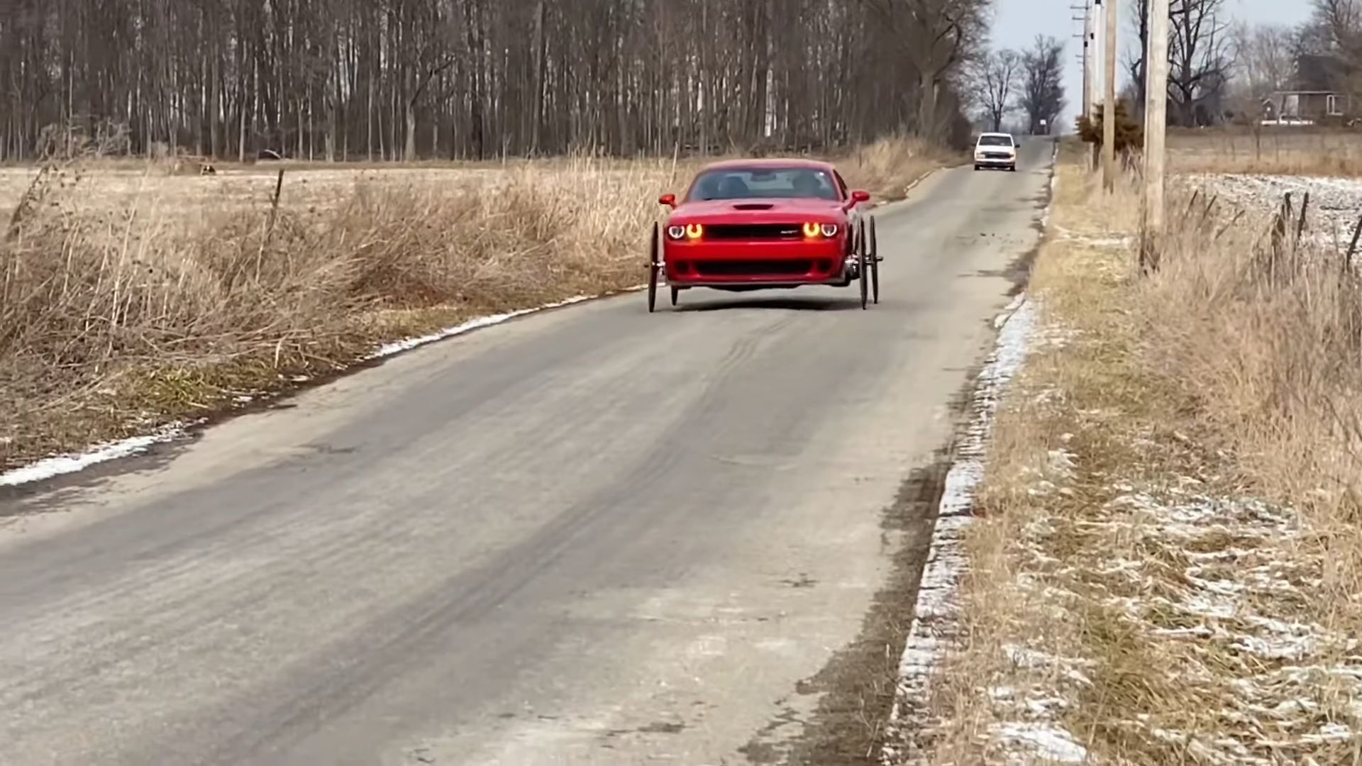 Someone Seriously Put a Dodge Challenger Hellcat On Buggy Wheels