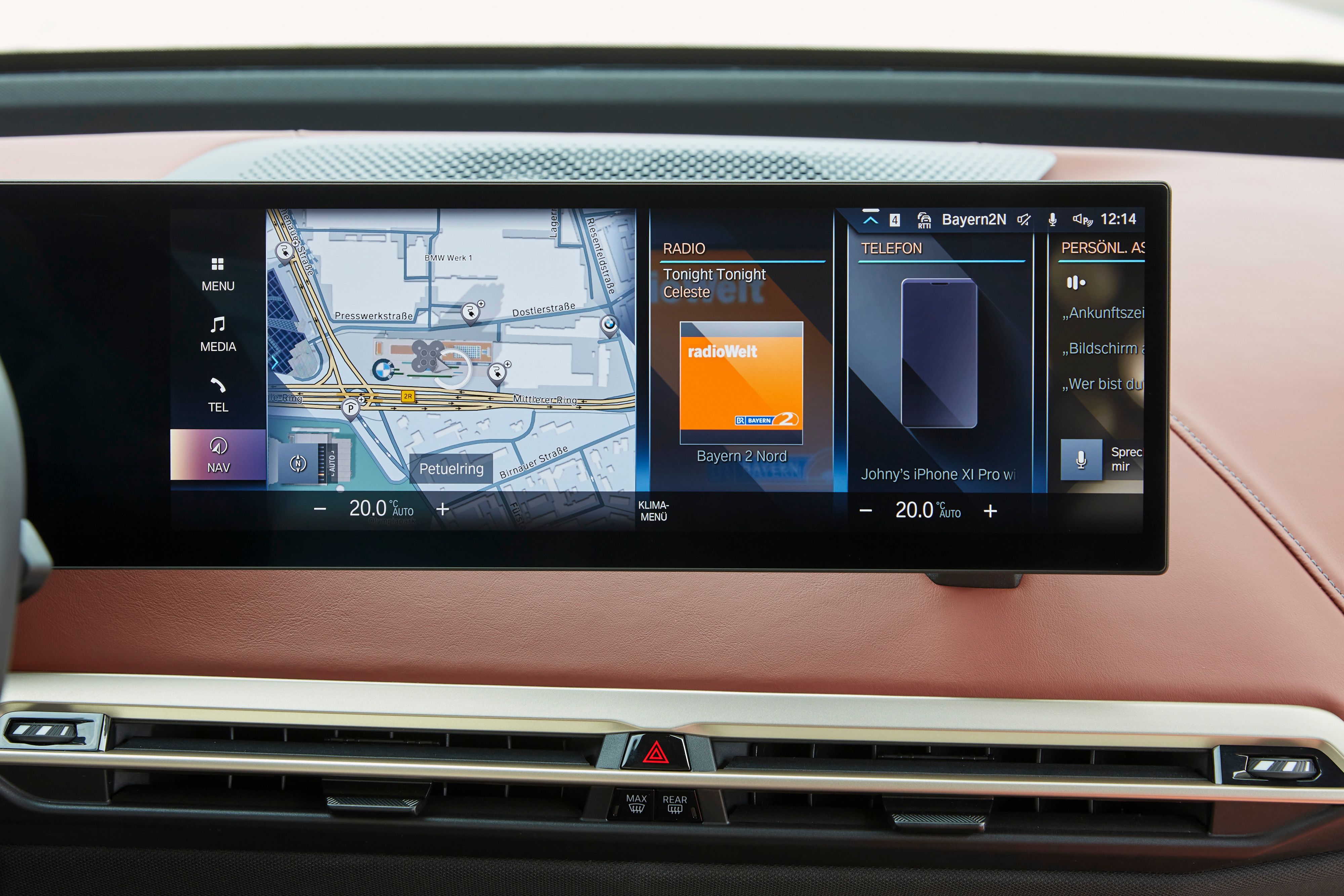 The BMW iX Breaks Cover A Funky Steering Wheel and 300 Miles of Range