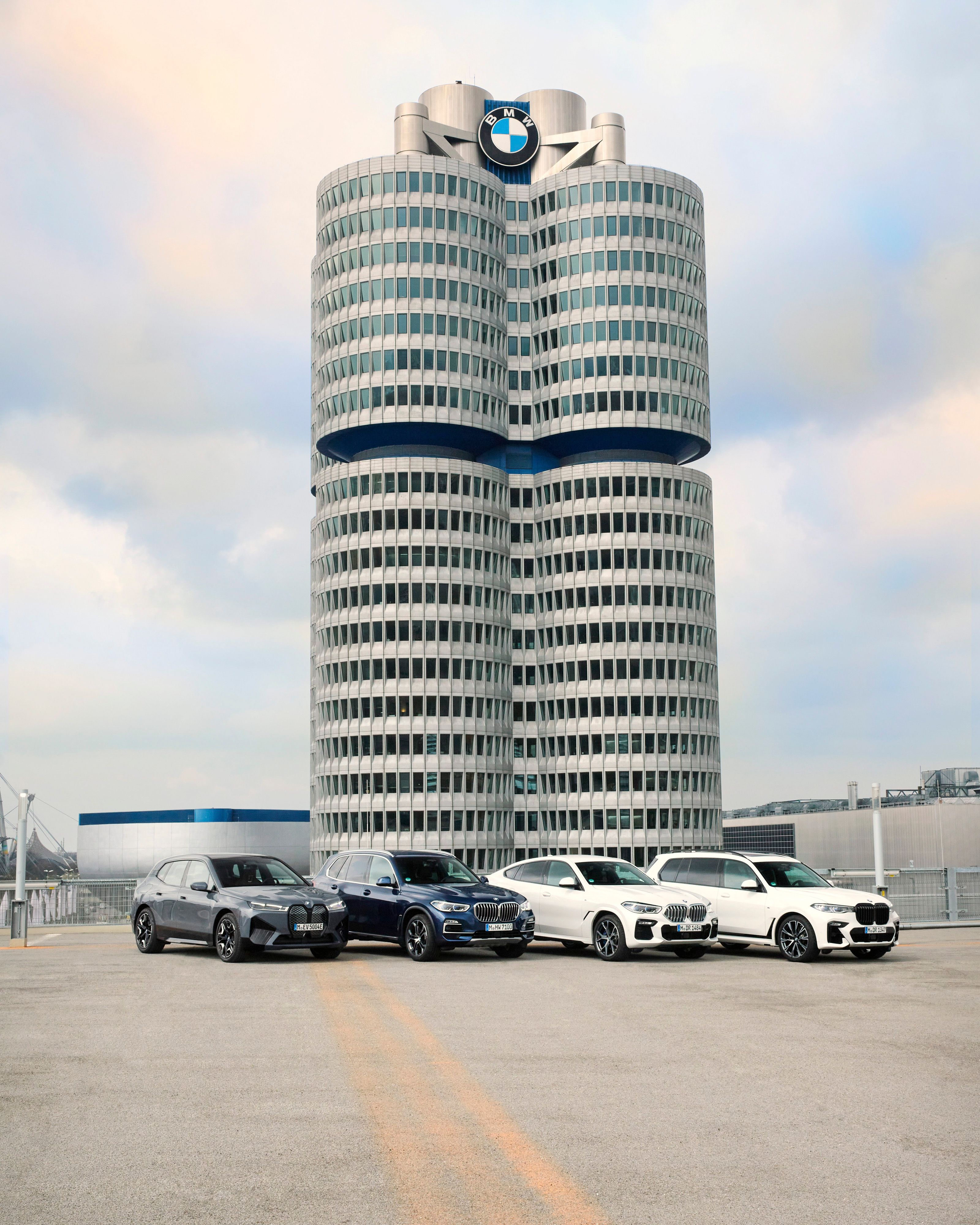 The BMW iX Breaks Cover A Funky Steering Wheel and 300 Miles of Range