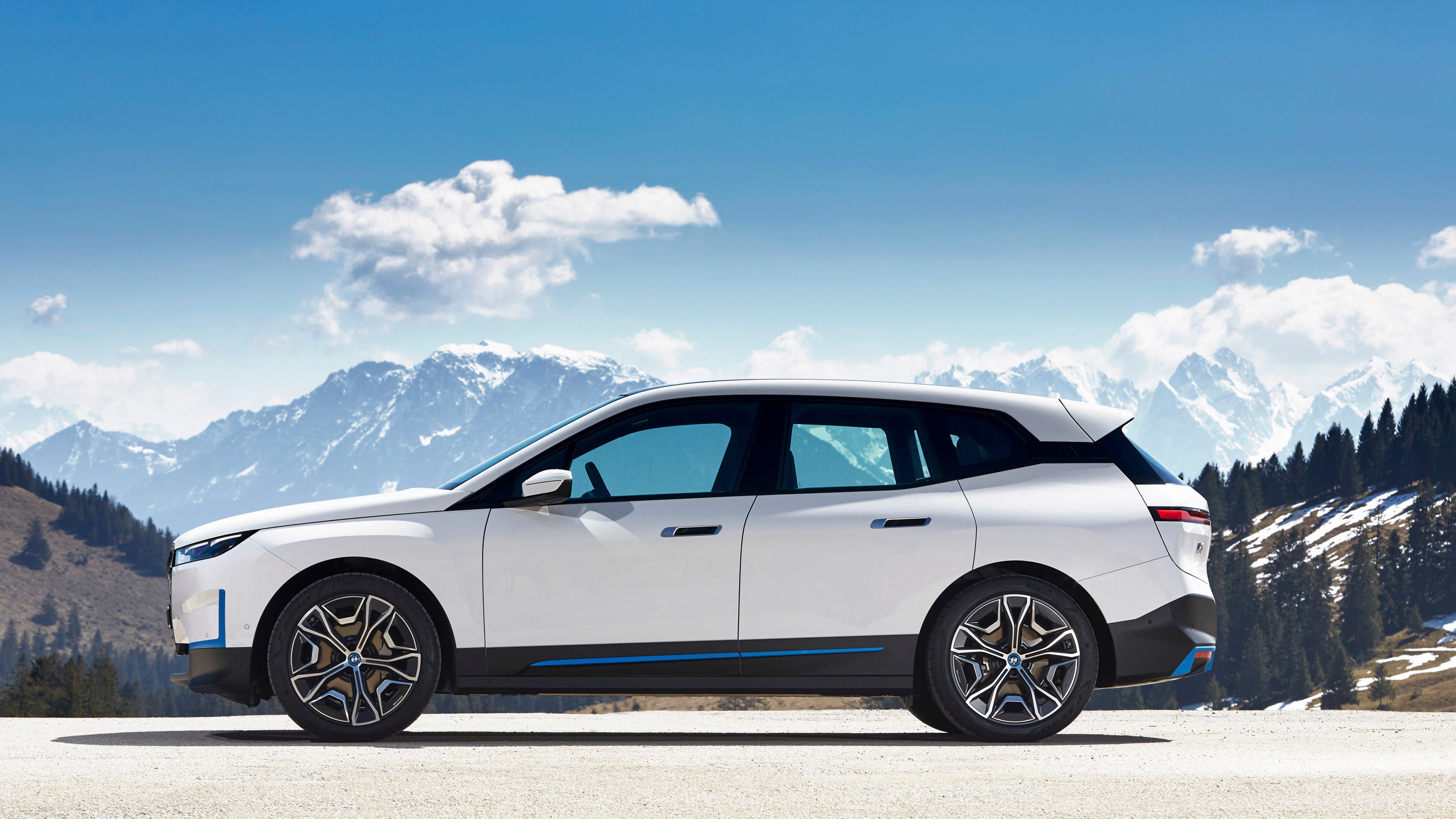 The BMW iX Breaks Cover A Funky Steering Wheel and 300 Miles of Range