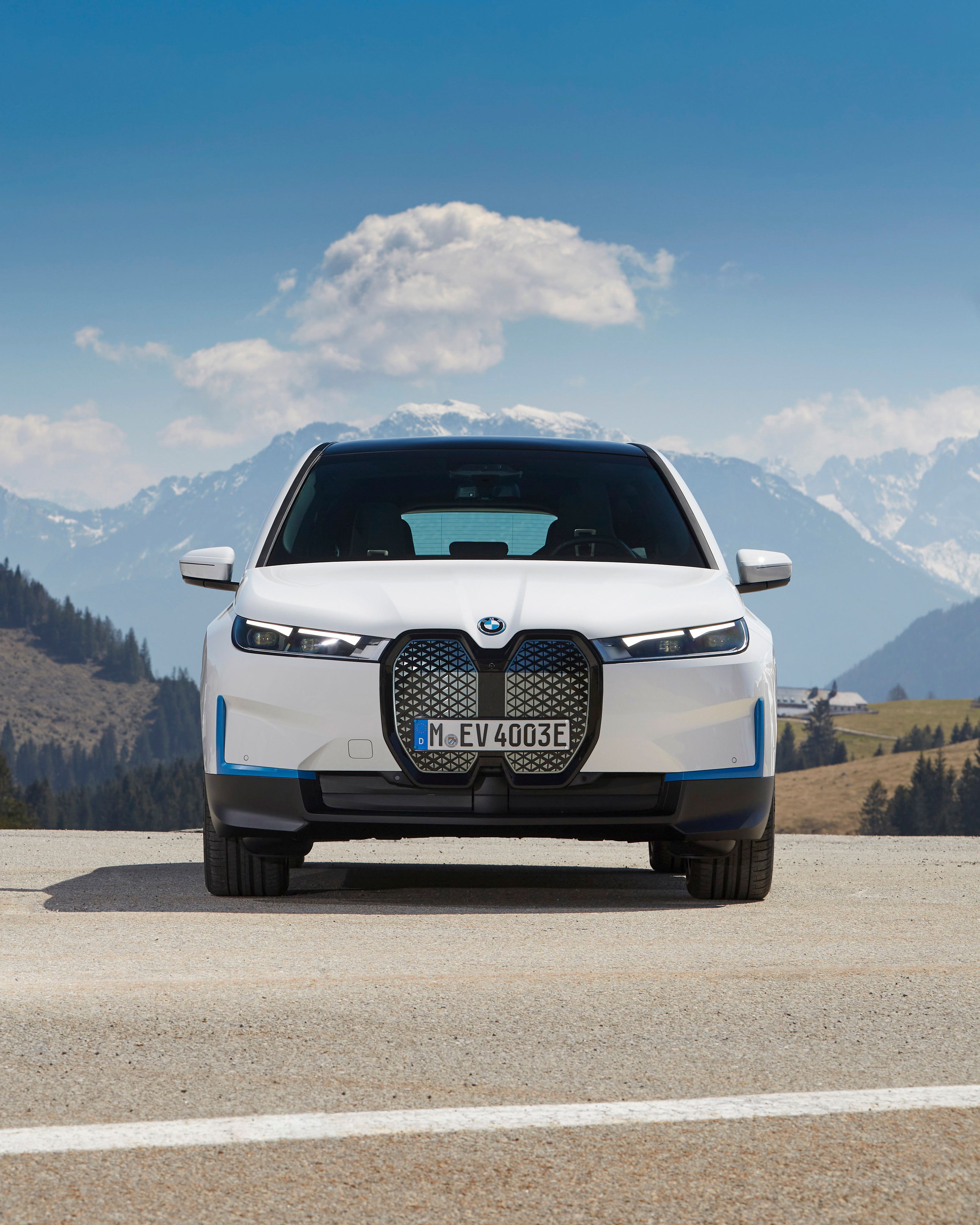 The BMW iX Breaks Cover A Funky Steering Wheel and 300 Miles of Range