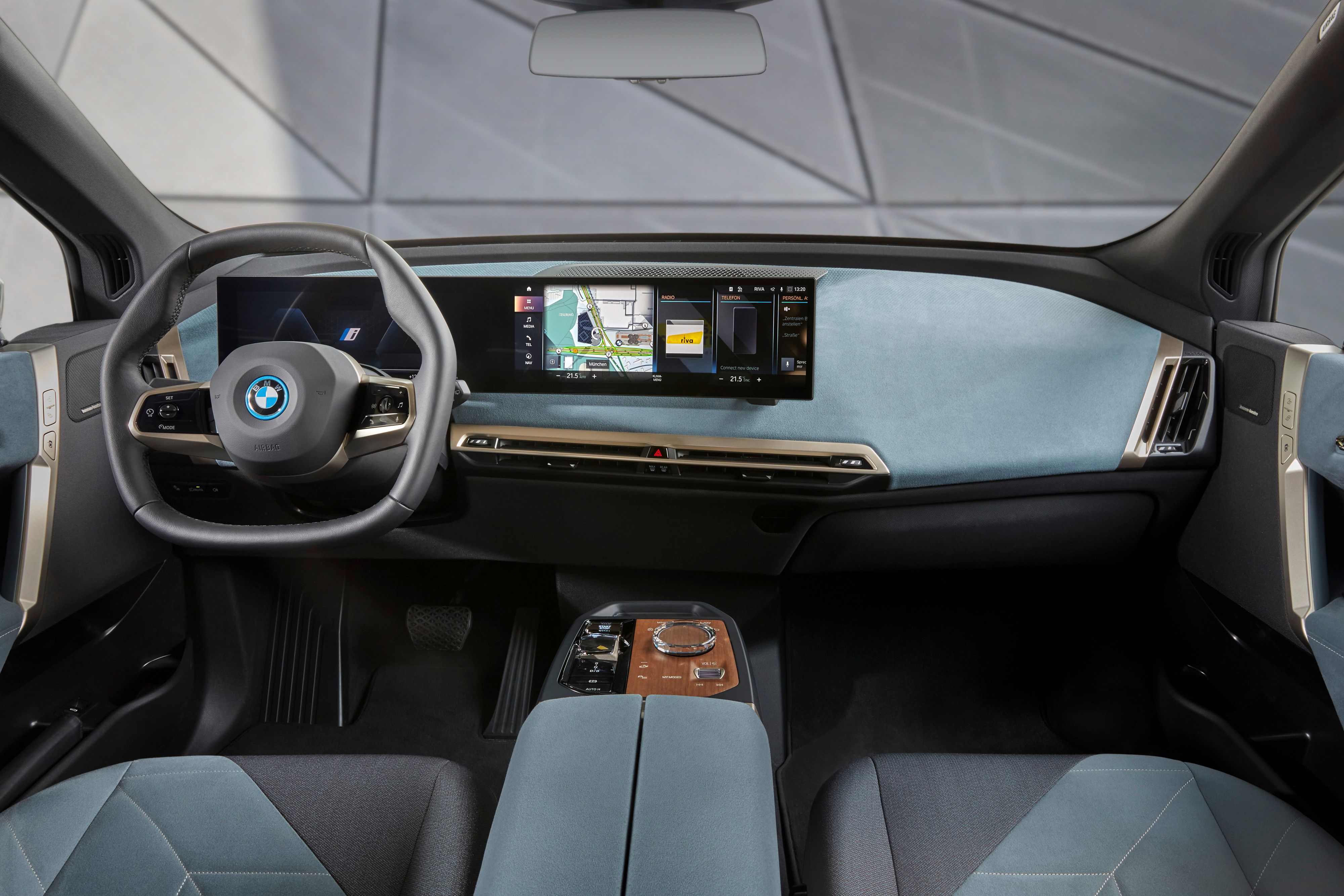 The BMW iX Breaks Cover A Funky Steering Wheel and 300 Miles of Range