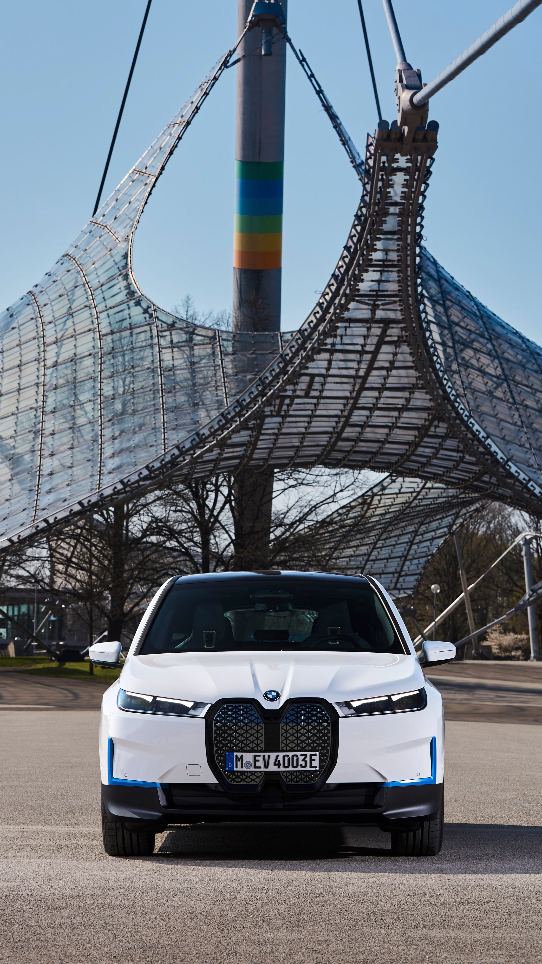 The BMW iX Breaks Cover A Funky Steering Wheel and 300 Miles of Range