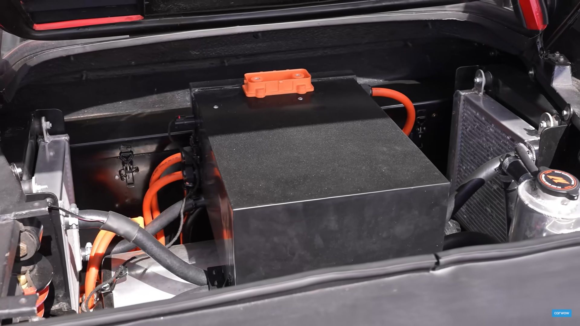 Can this Tesla-powered Ferrari 308 beat the iconic Testarossa?