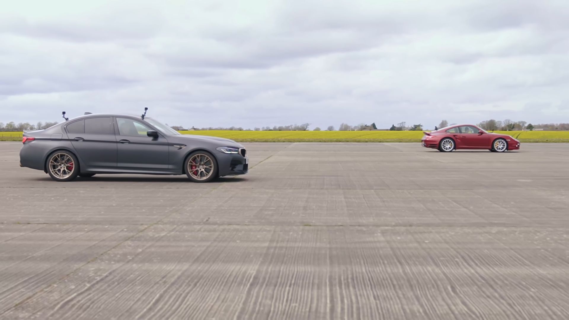 Watch a BMW M5 CS Fight It Out With the 997 Porsche 911 Turbo S