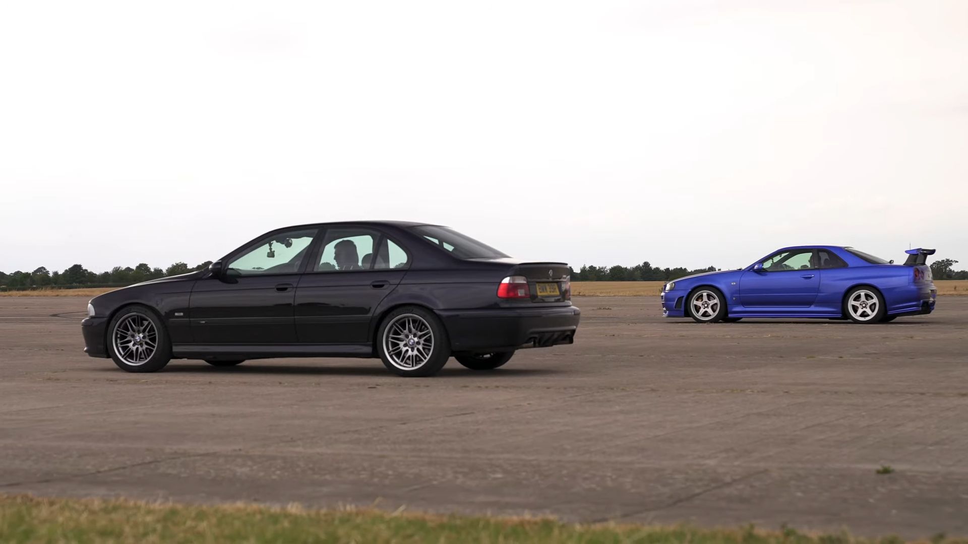 Battle Of The 1990s Icons: BMW E39 M5 Drag Races a Nissan Skyline R34 GT-R